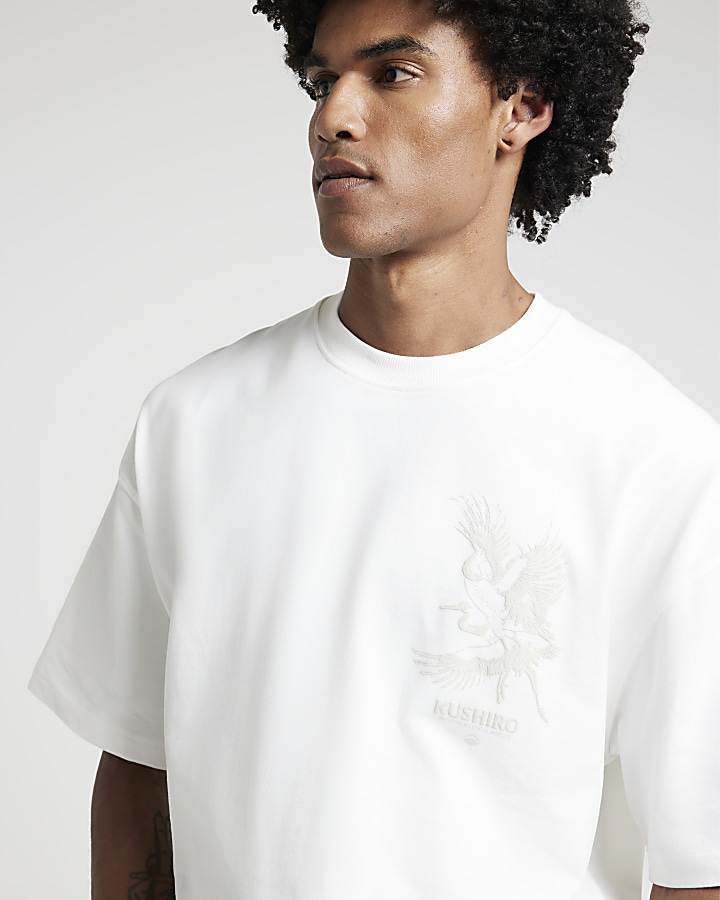 White oversized fit embossed graphic t-shirt | River Island
