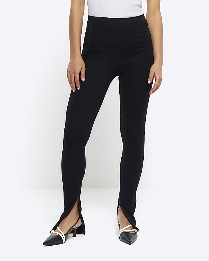 Petite black zip hem leggings | River Island