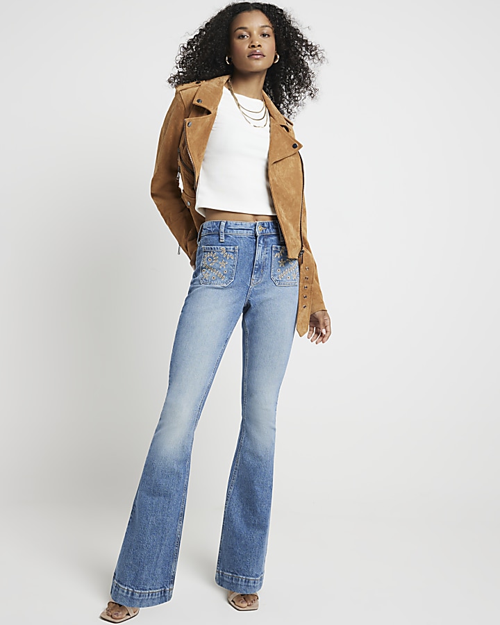 Blue high waisted embroidered flared jeans | River Island