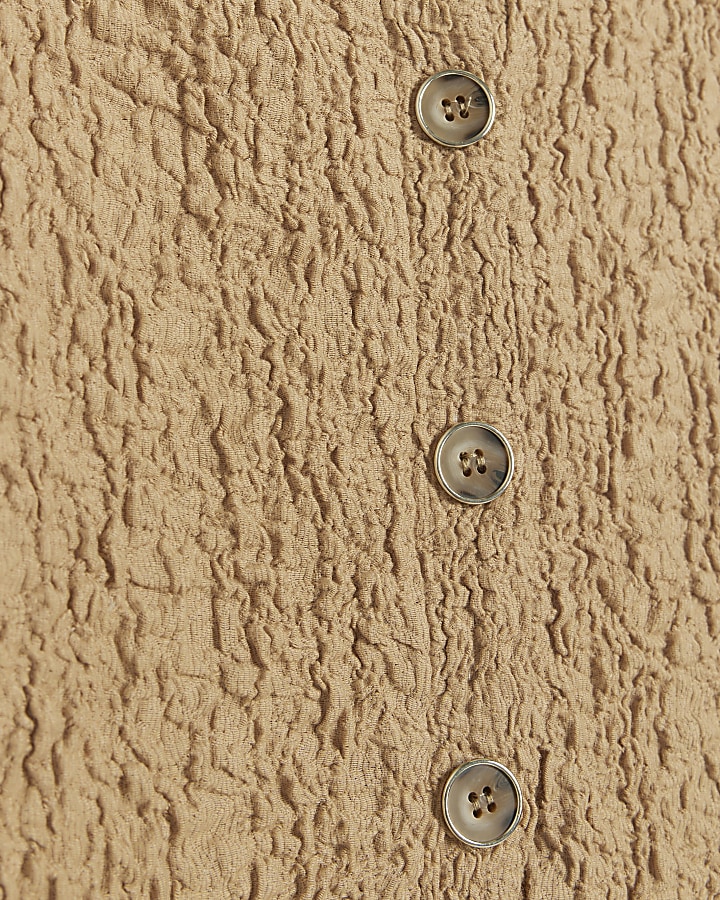 Beige textured sleeveless shirt | River Island