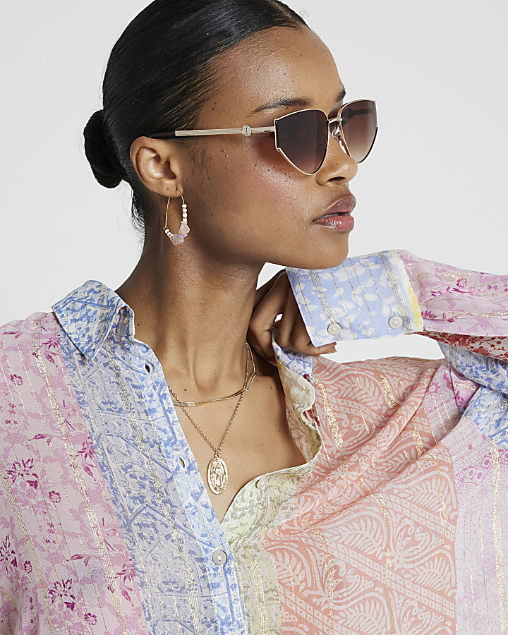 Pink floral pull on shorts | River Island