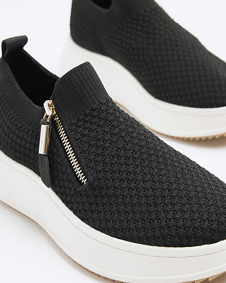 Black knitted wedge trainers | River Island