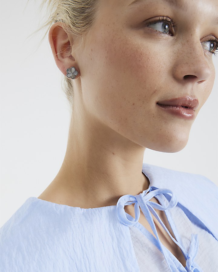 Silver flower stud earrings | River Island