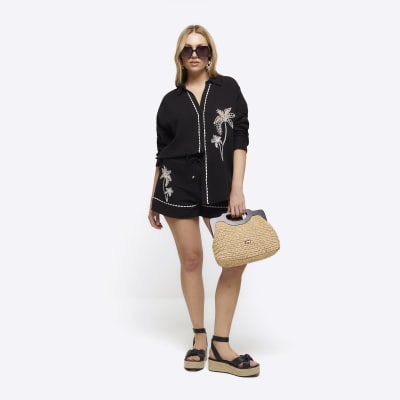 Black embroidered palm tree shorts | River Island