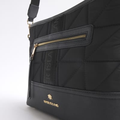 Black webbing quilted cross body bag | River Island