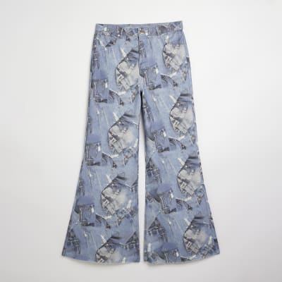 Blue graphic high waisted ultra flared jeans | River Island