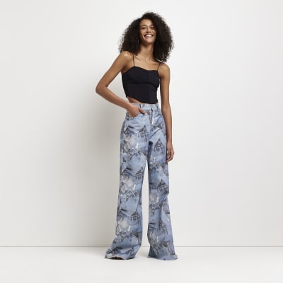 Blue graphic high waisted ultra flared jeans | River Island