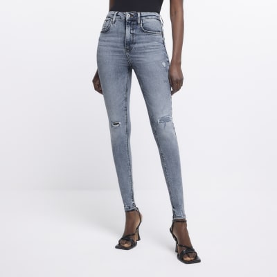 Blue ripped high waisted skinny jeans | River Island