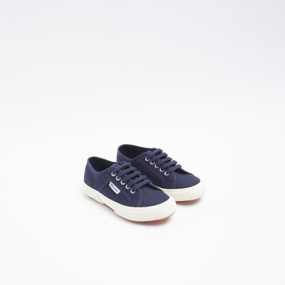 Girls navy Superga lace up canvas trainers | River Island
