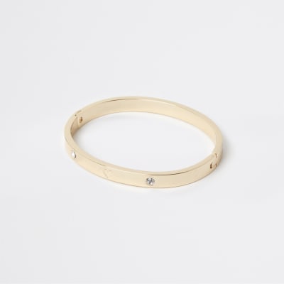 Gold stainless steel heart cuff bracelet | River Island