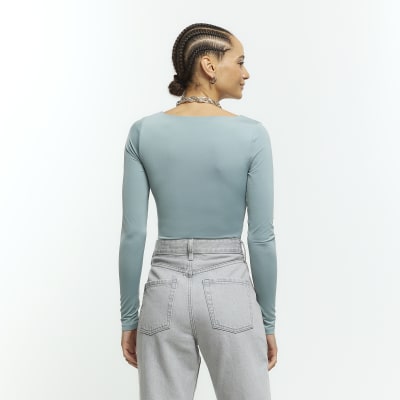 Green long sleeve bodysuit | River Island